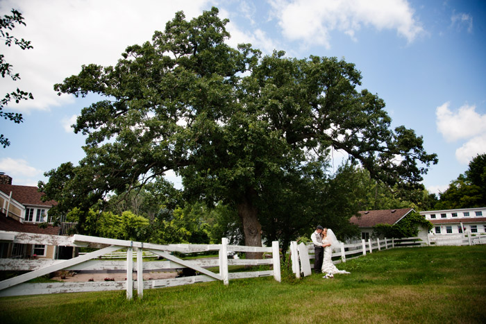 hope-glen-farm-wedding-bride-groom-kissing-under-big-oak-tree - Michael ...