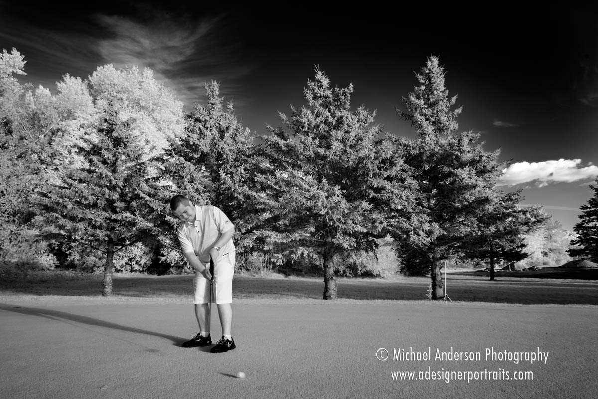 Cool B&W infrared high school senior portrait of Brandon on a putting ...