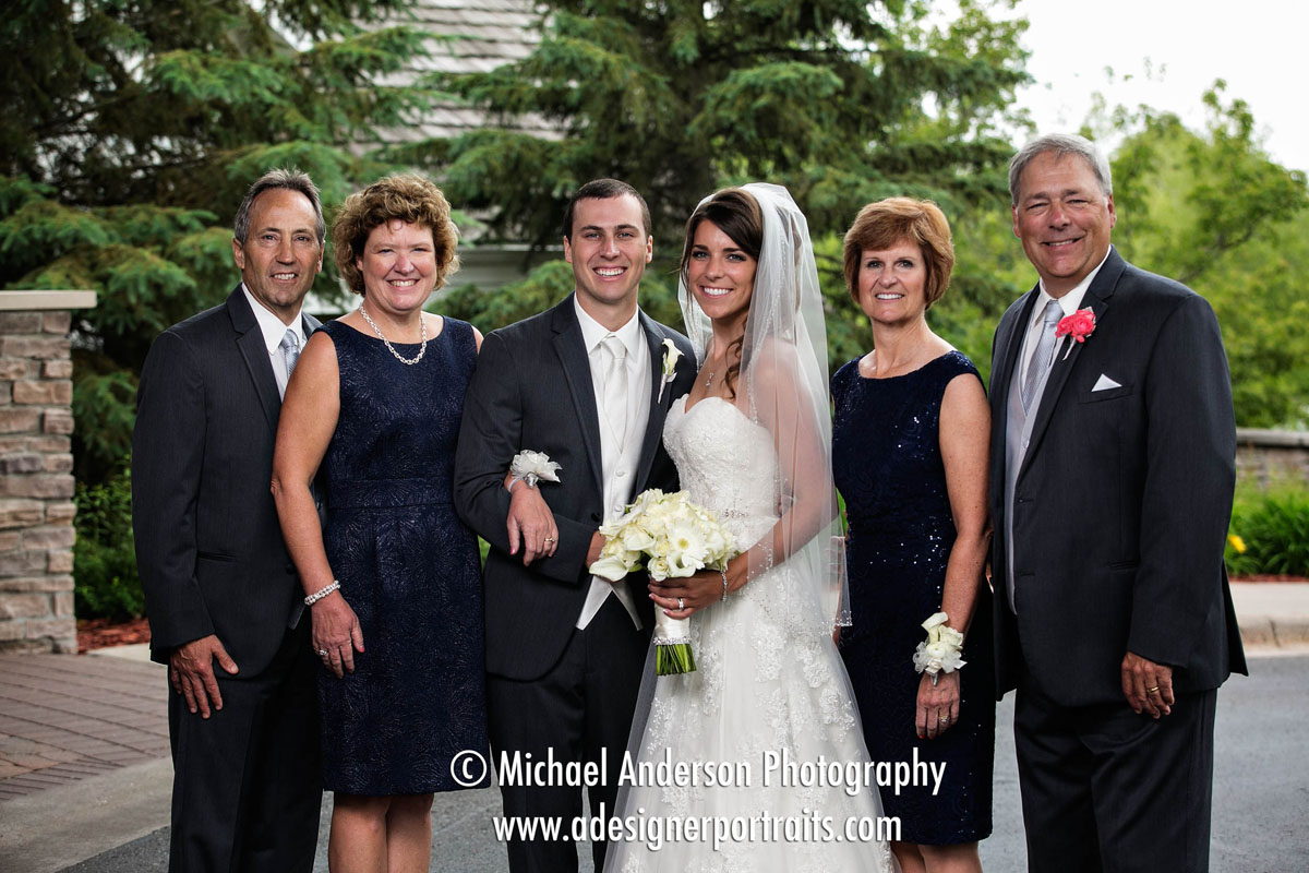 Bride And Groom With Parents